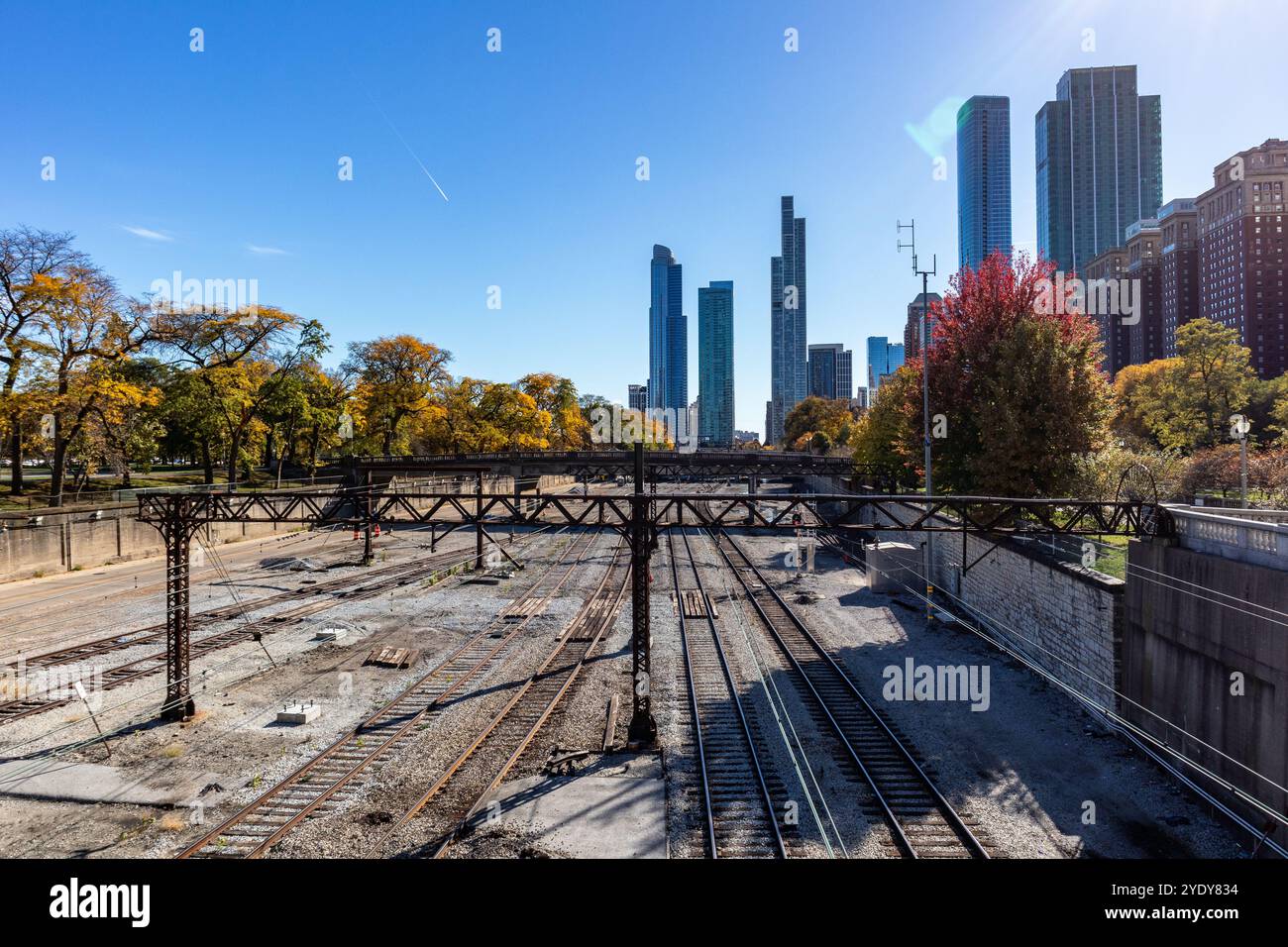 Empty train yard in downtown Chicago with city skyline in the ...