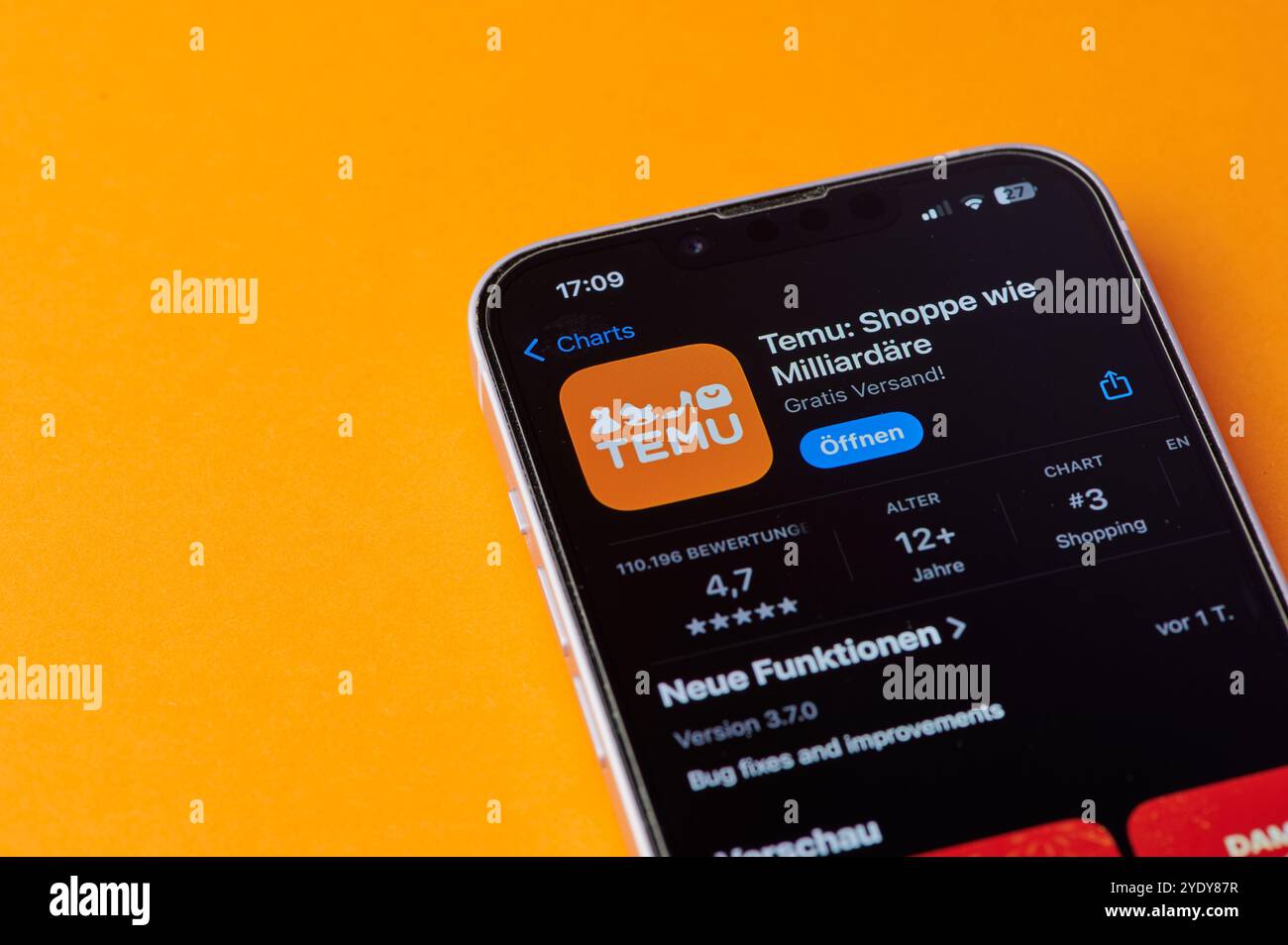 icon of the Temu shopping app on a smartphone screen on orange ...