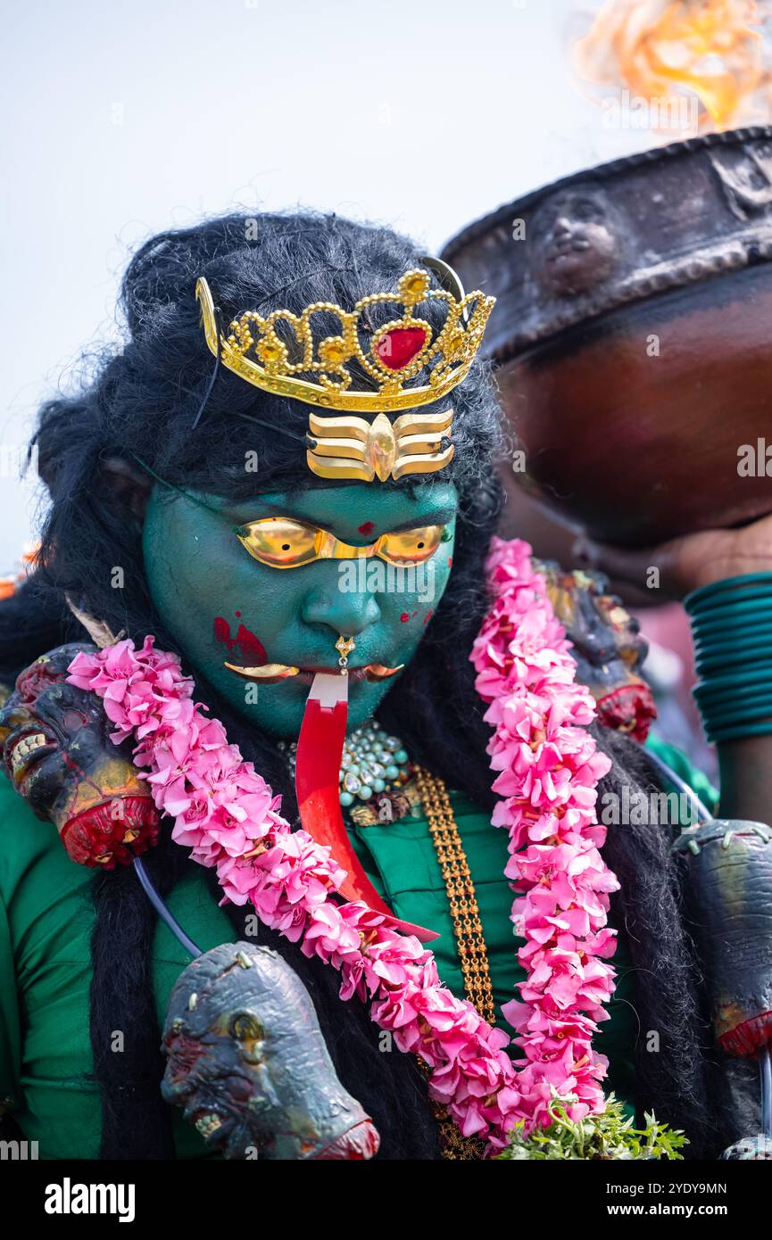 Kulasai Dasara, Portrait of indian hindu devotee with painted face and ...