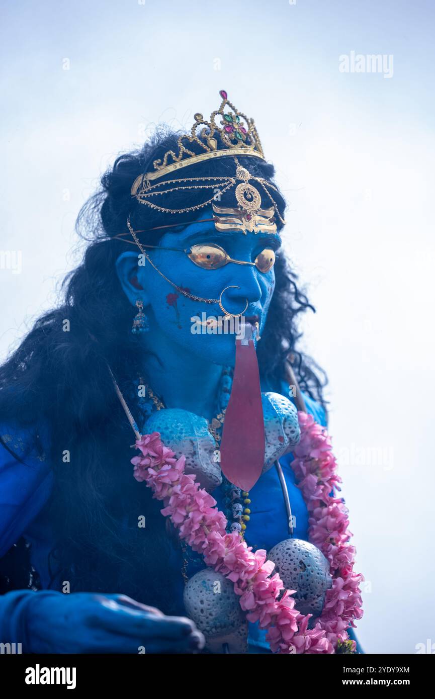 Kulasai Dasara, Portrait of indian hindu devotee with painted face and ...