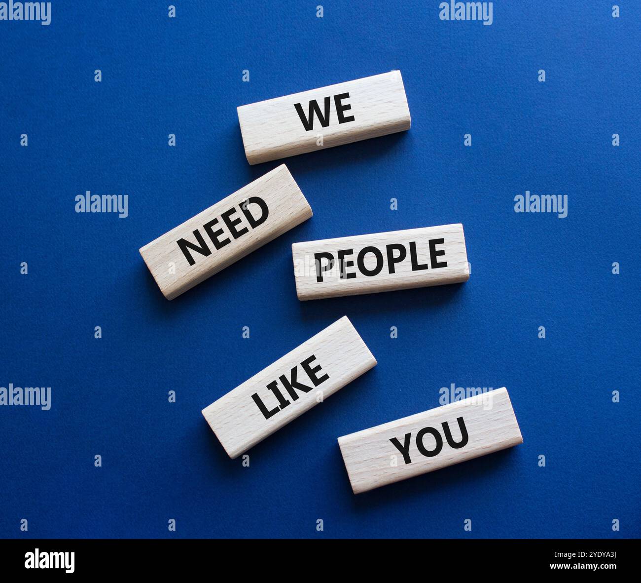 Hiring symbol. Wooden blocks with words We need People like You ...
