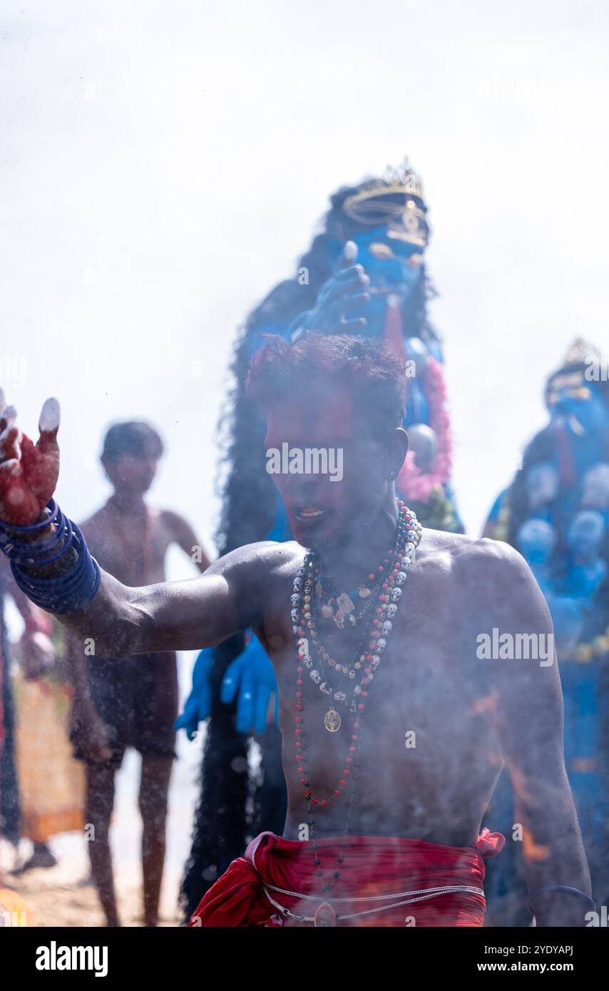 Kulasai Dasara, Portrait of indian hindu devotee with painted face and ...