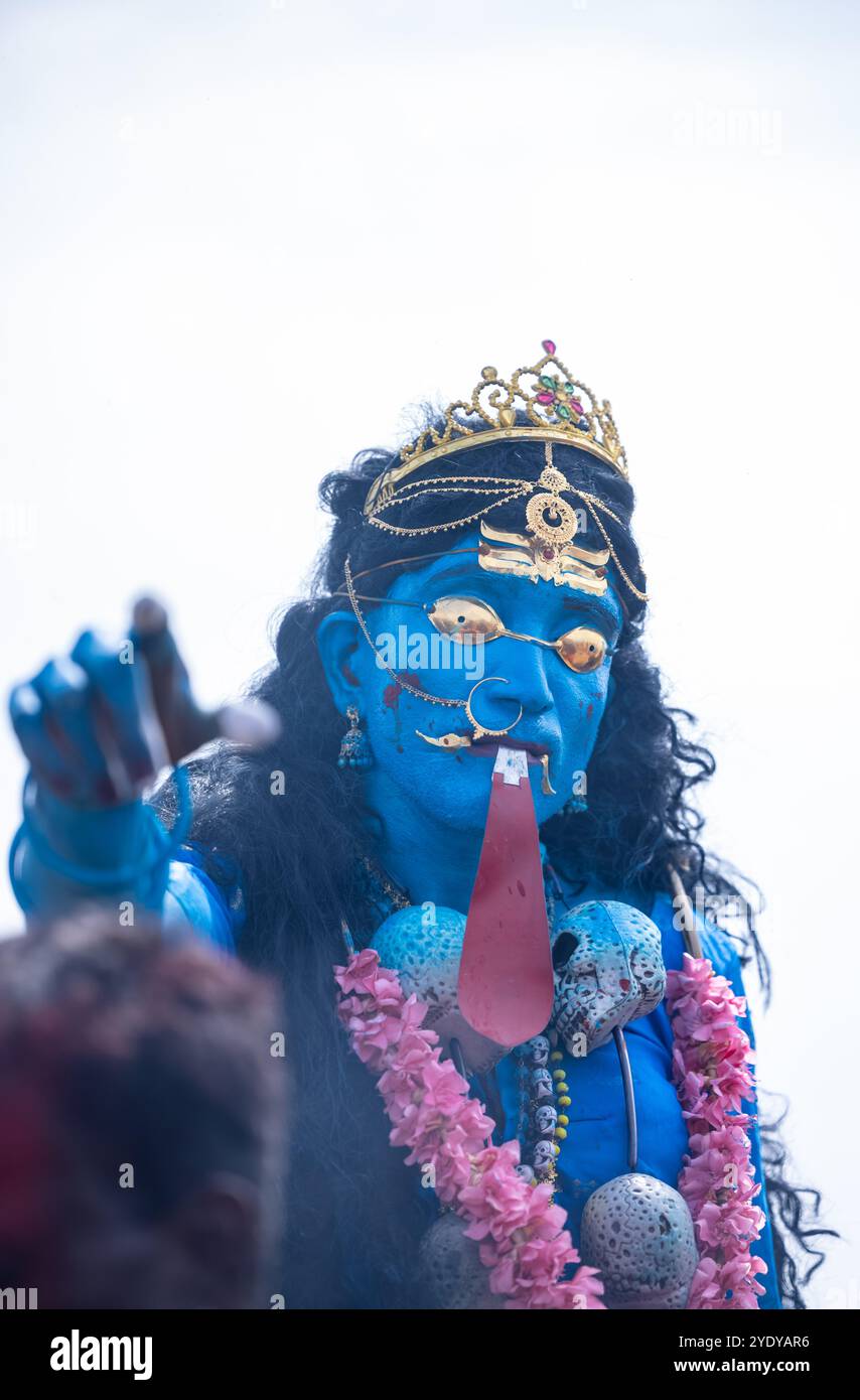 Kulasai Dasara, Portrait of indian hindu devotee with painted face and ...