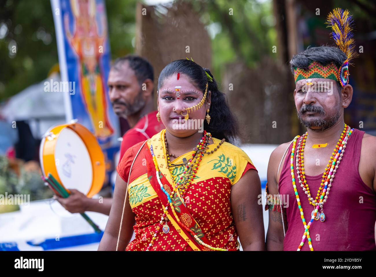 Kulasai Dasara, Portrait of indian hindu devotee with painted face and ...