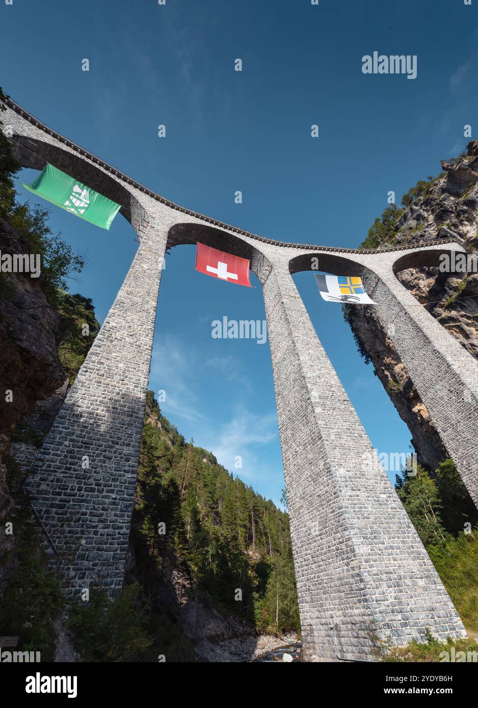 Looking up at Landwasserviadukt. Curved railway viaduct in Abula alps ...