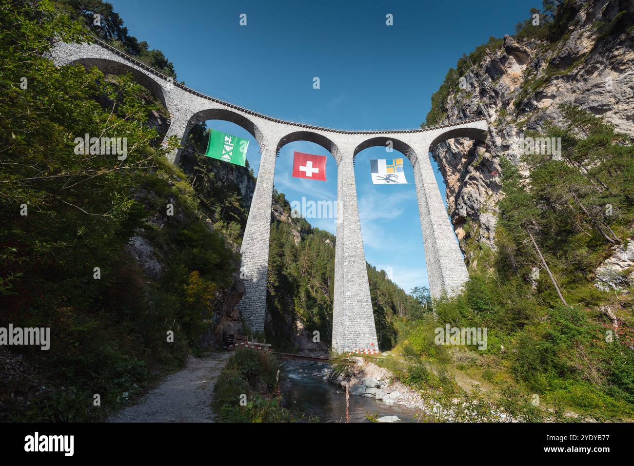 Looking up at Landwasserviadukt. Curved railway viaduct in Abula alps ...