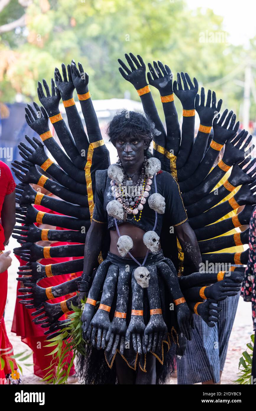 Kulasai Dasara, Portrait of indian hindu devotee with painted face and ...