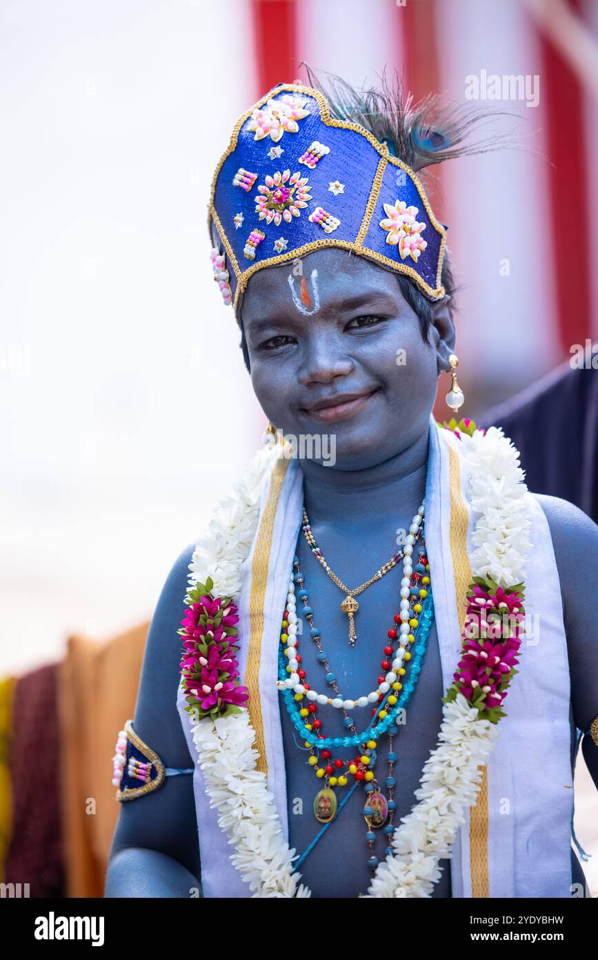 Kulasai Dasara, Portrait of indian hindu devotee with painted face and ...