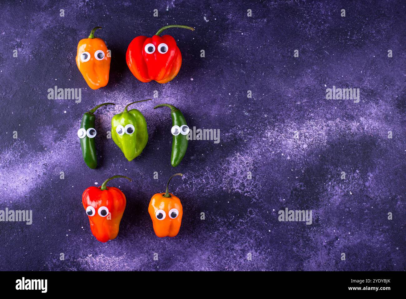 Cute color bell pepper with eyes Stock Photo - Alamy