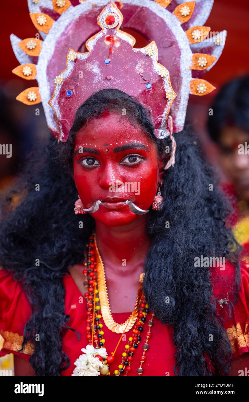Kulasai Dasara, Portrait of indian hindu devotee with painted face and ...