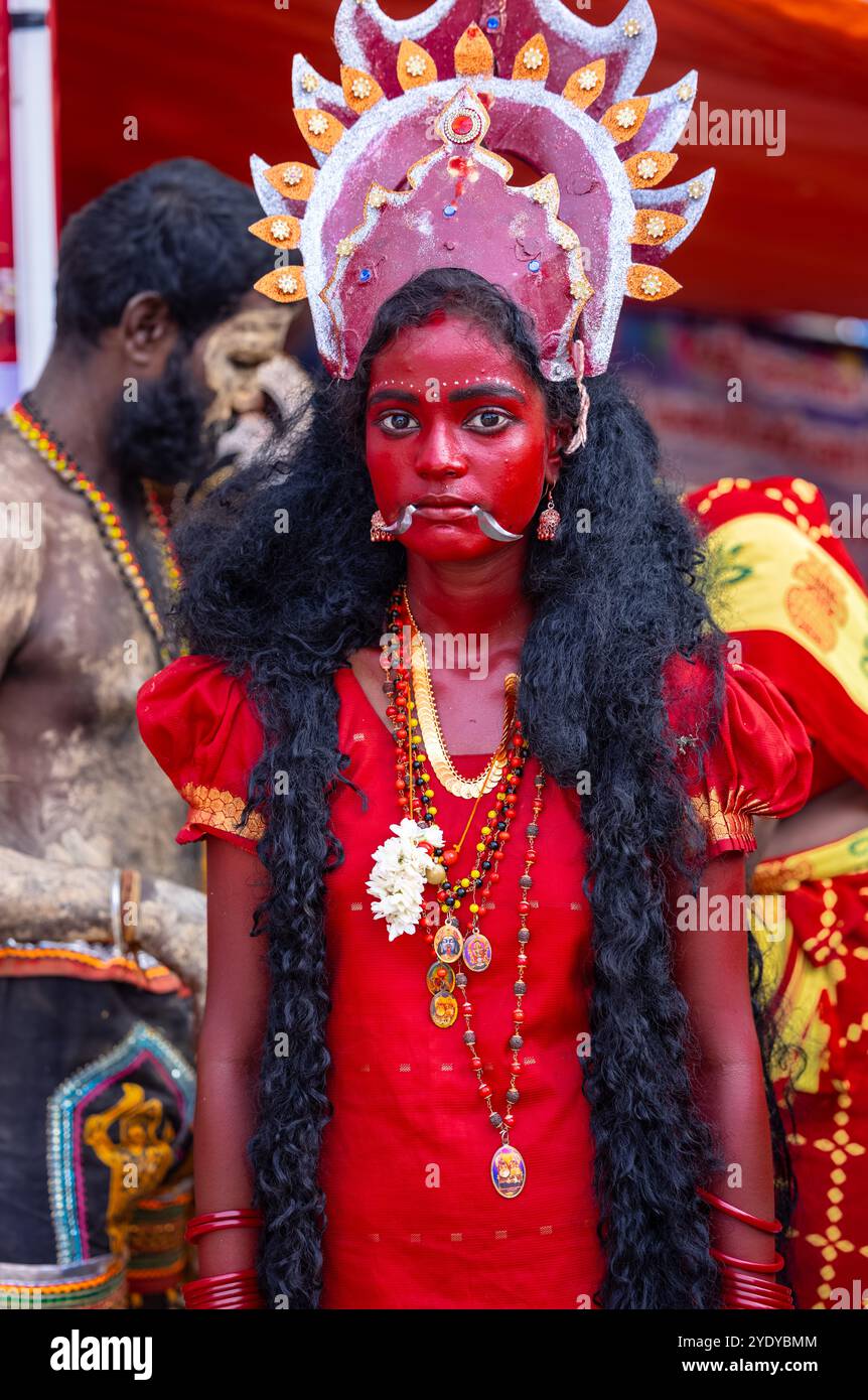 Kulasai Dasara, Portrait of indian hindu devotee with painted face and ...