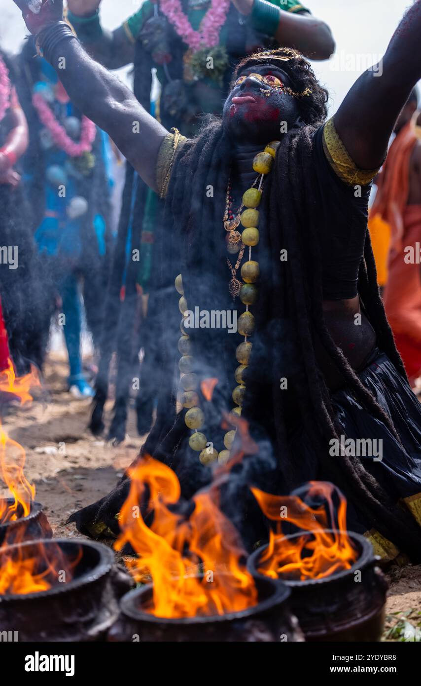 Kulasai Dasara, Portrait of indian hindu devotee with painted face and ...
