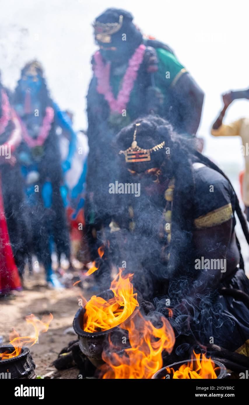 Kulasai Dasara, Portrait of indian hindu devotee with painted face and ...