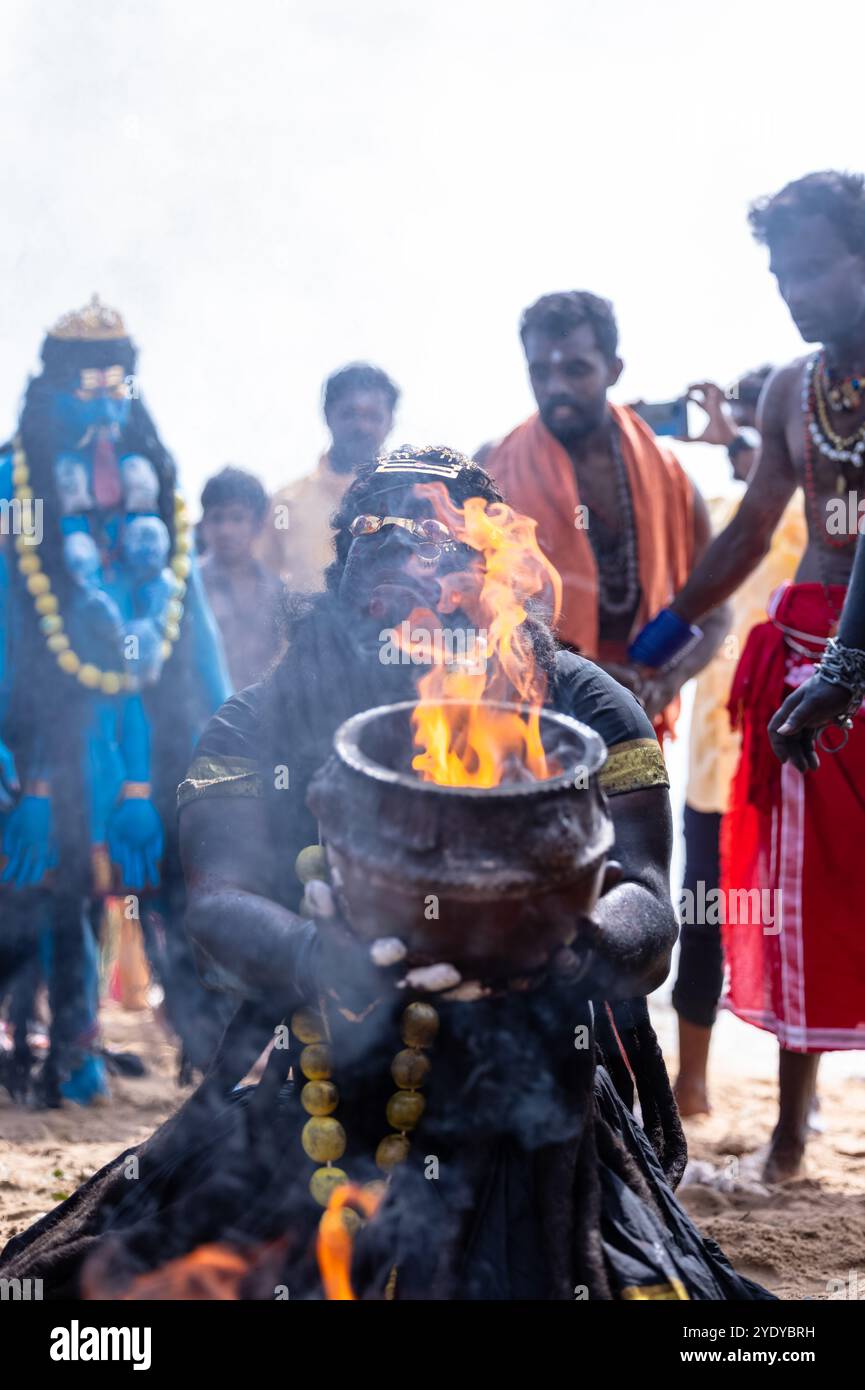 Kulasai Dasara, Portrait of indian hindu devotee with painted face and ...