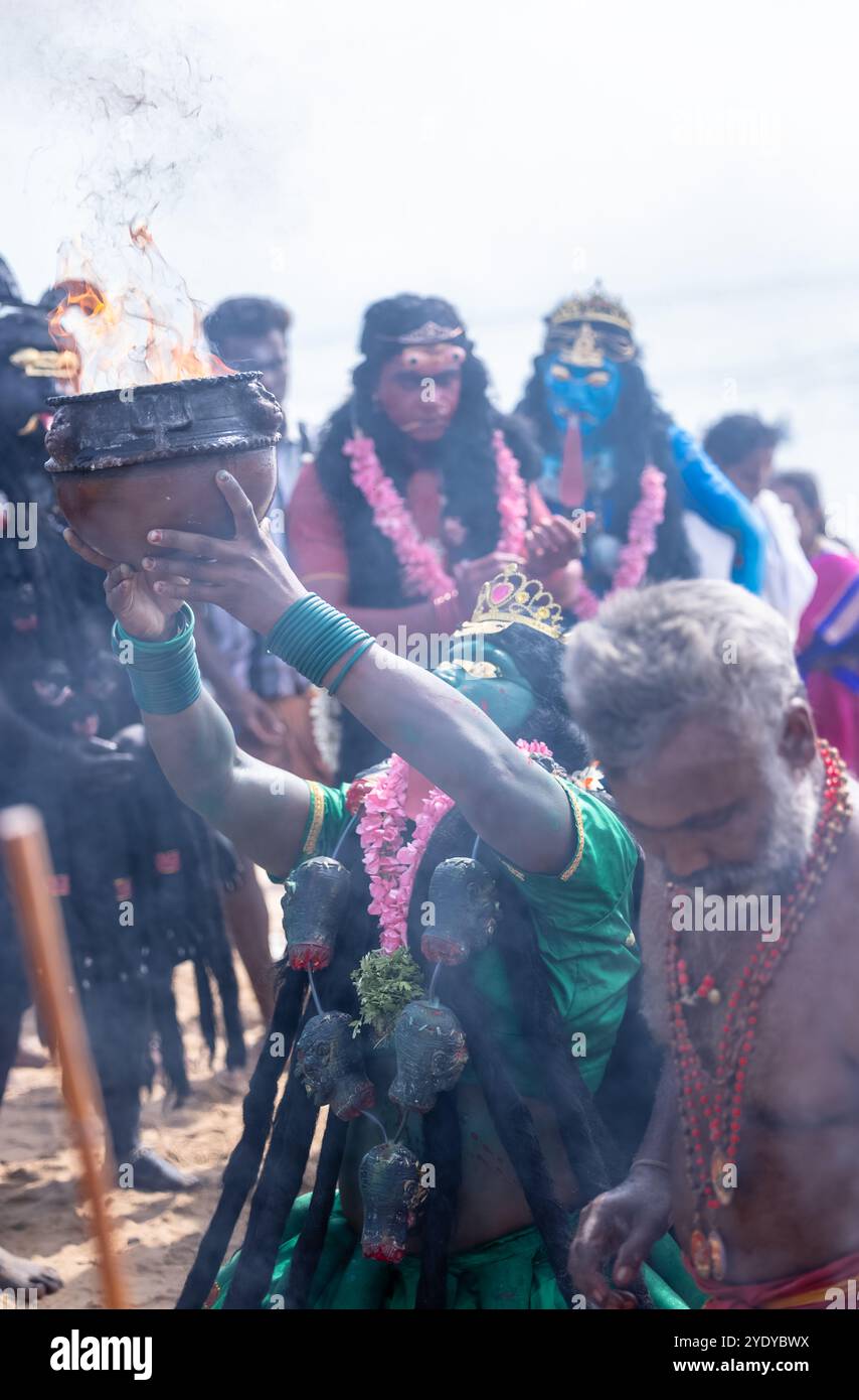 Kulasai Dasara, Portrait of indian hindu devotee with painted face and ...