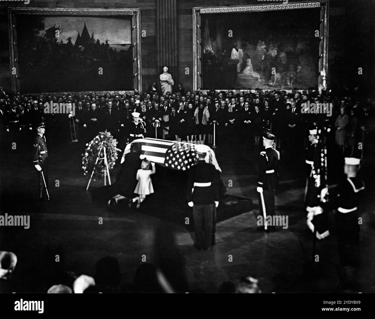 Jacqueline Kennedy and daughter Caroline Kennedy kneel and kiss U.S ...