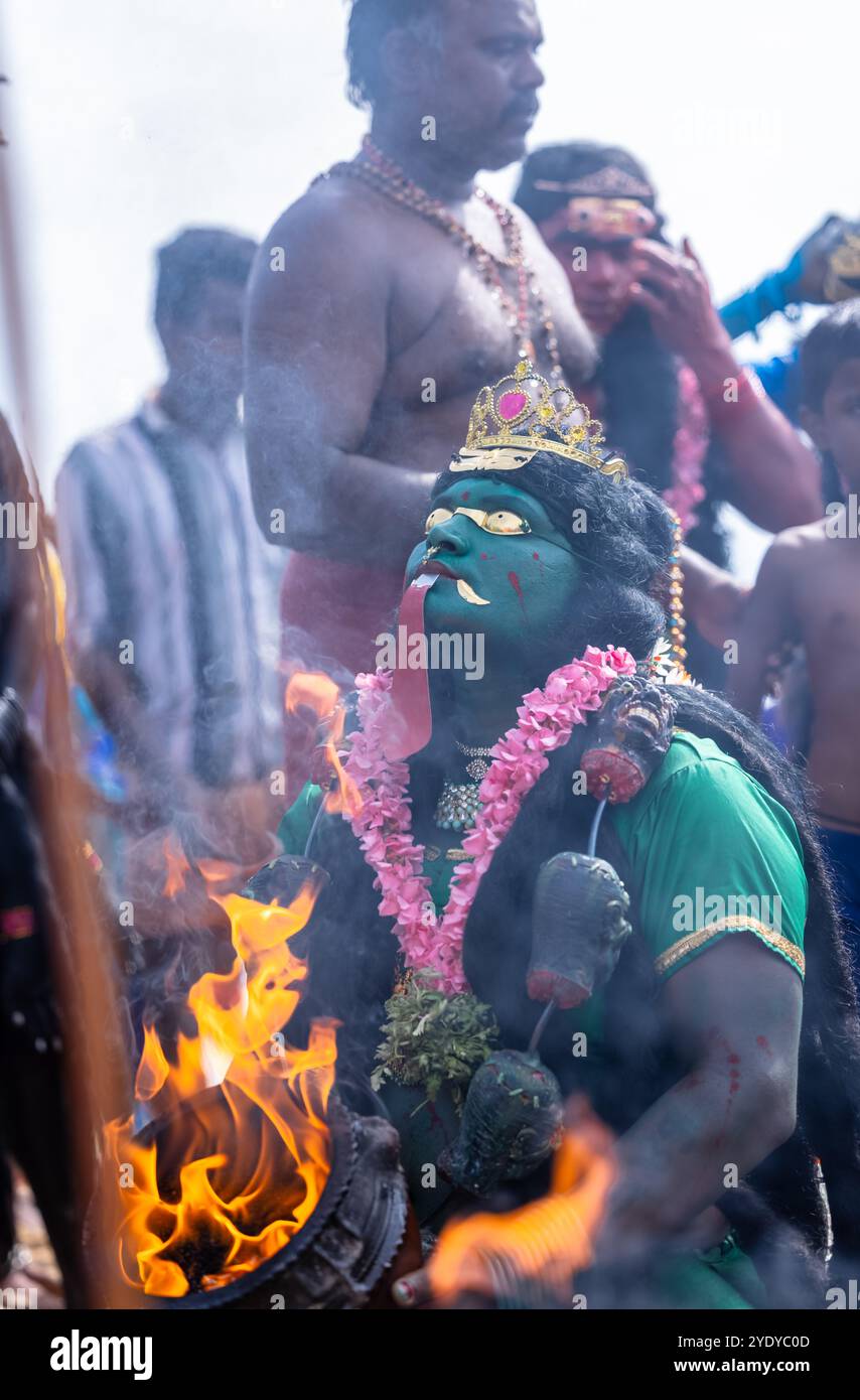 Kulasai Dasara, Portrait of indian hindu devotee with painted face and ...