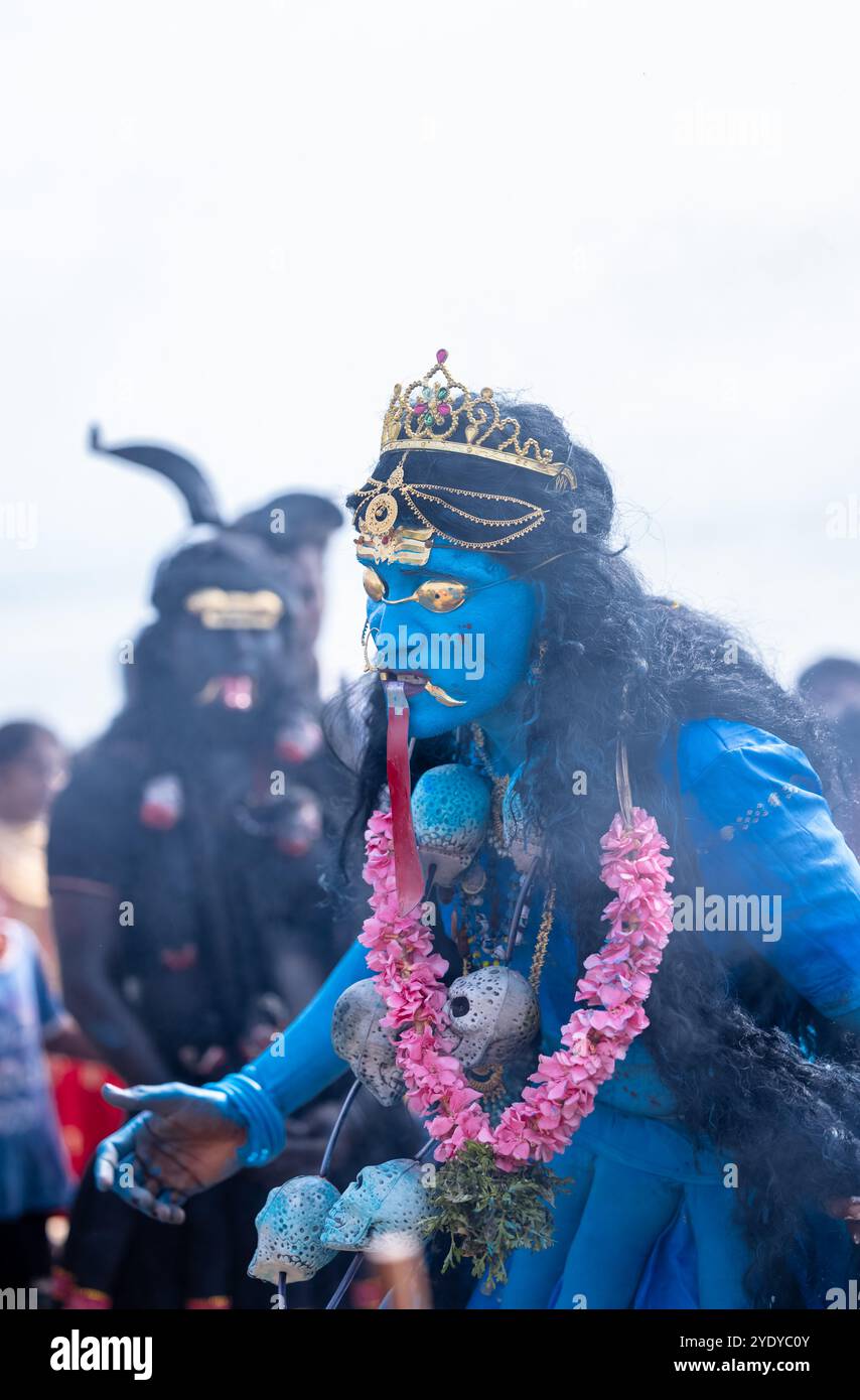 Kulasai Dasara, Portrait of indian hindu devotee with painted face and ...