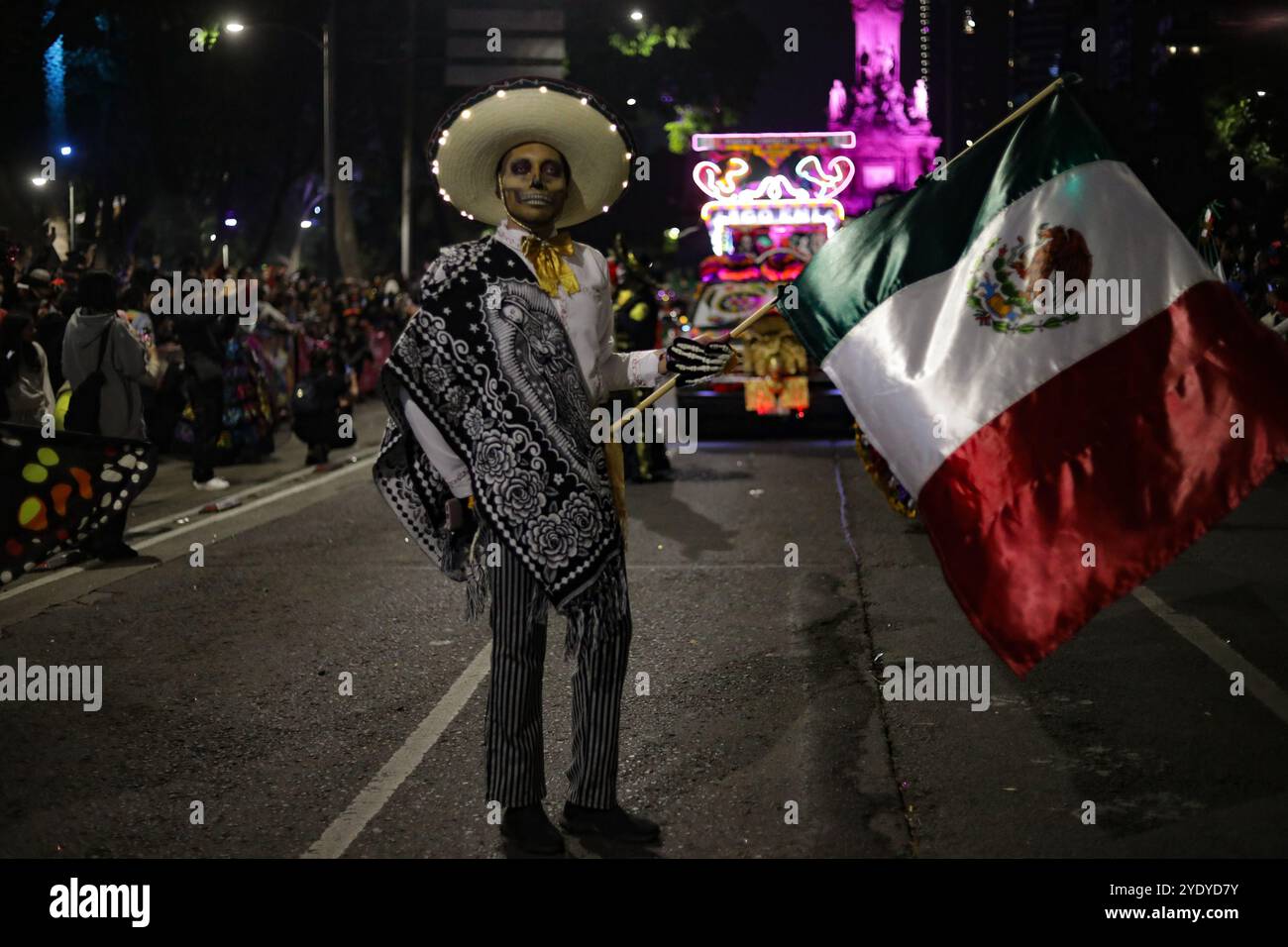 Non Exclusive: A Person dressed up as Mexican charro and with his face ...