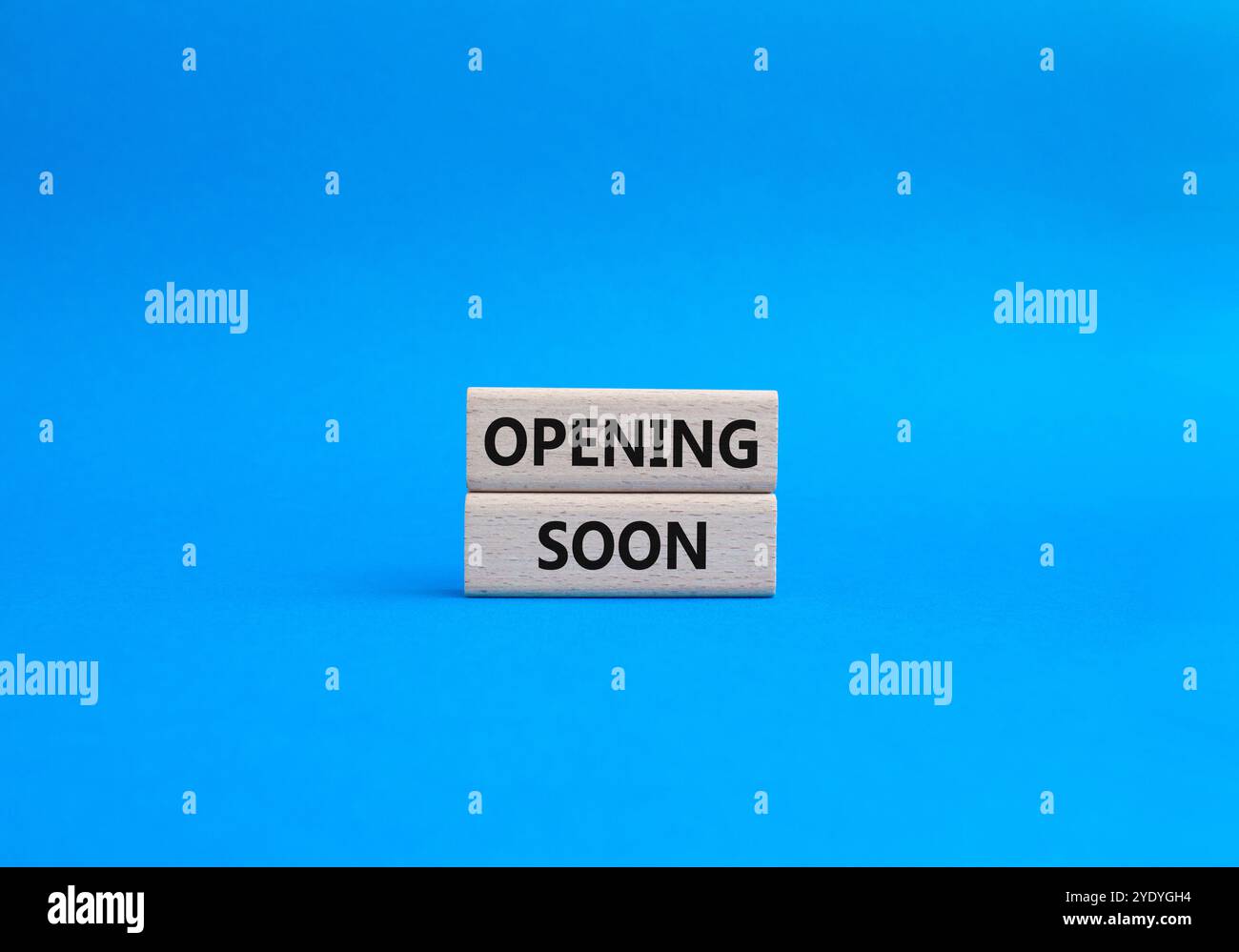 Opening soon symbol. Concept word Opening soon on wooden blocks ...