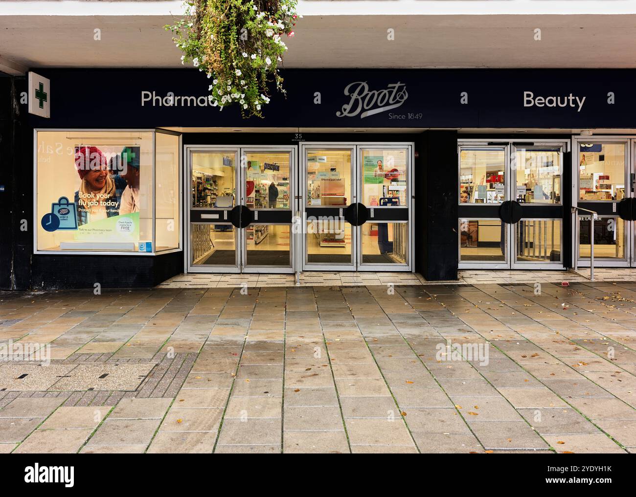 Boots pharmacy and shop in the town centre at Kettering, England, on a ...