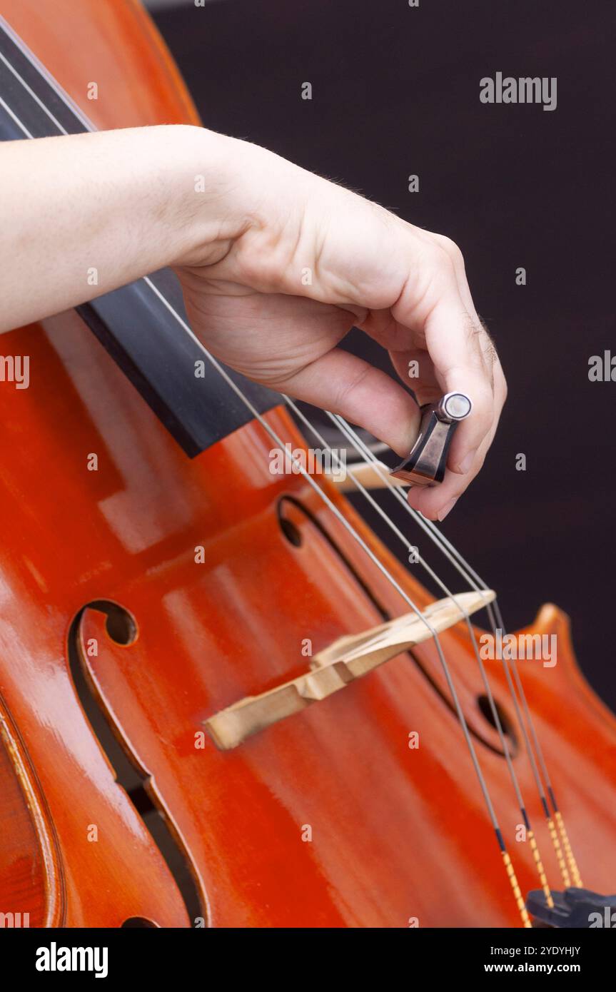 Hold a cello bow hi-res stock photography and images - Alamy