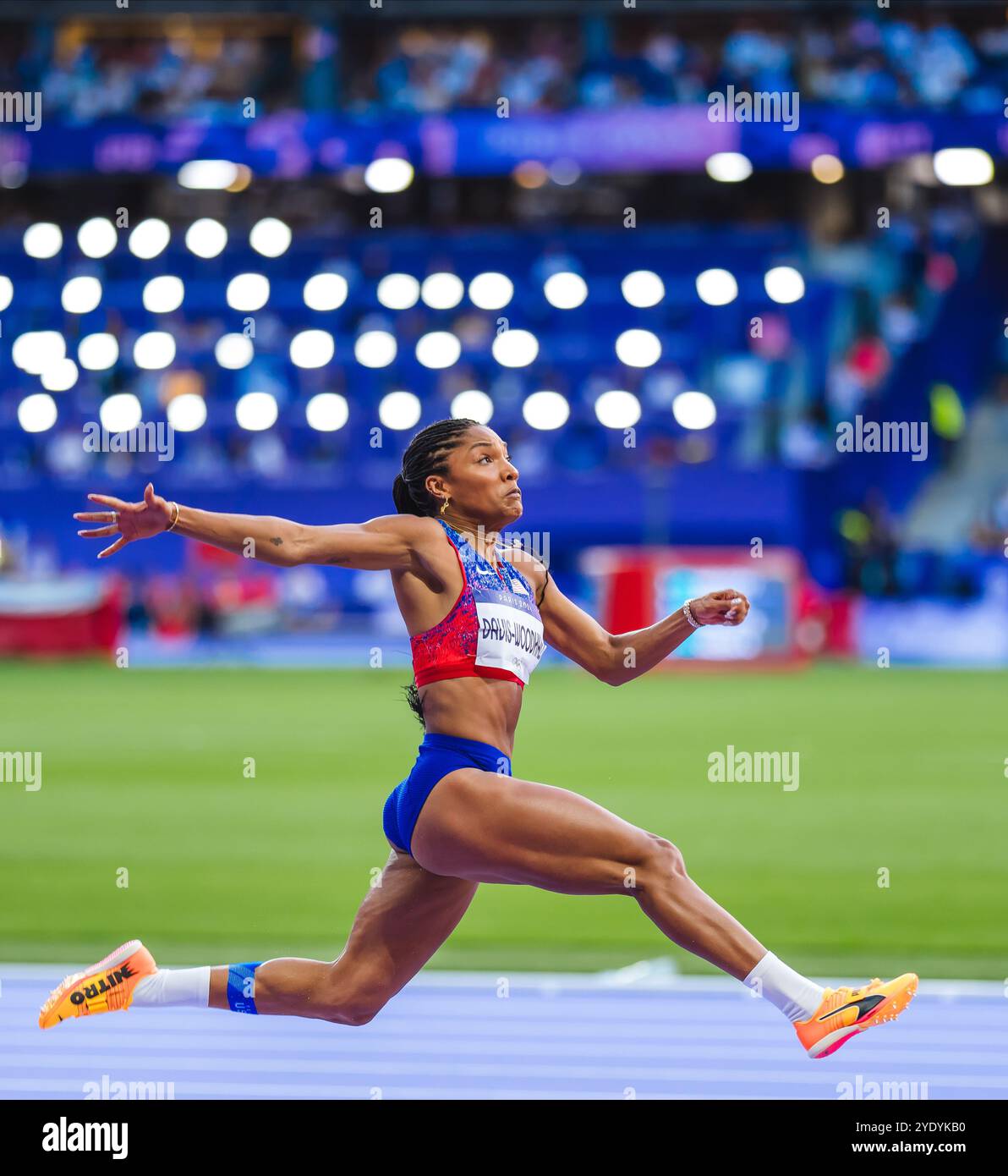 Tara Davis-Woodhall participating in the long jump at the Paris 2024 ...