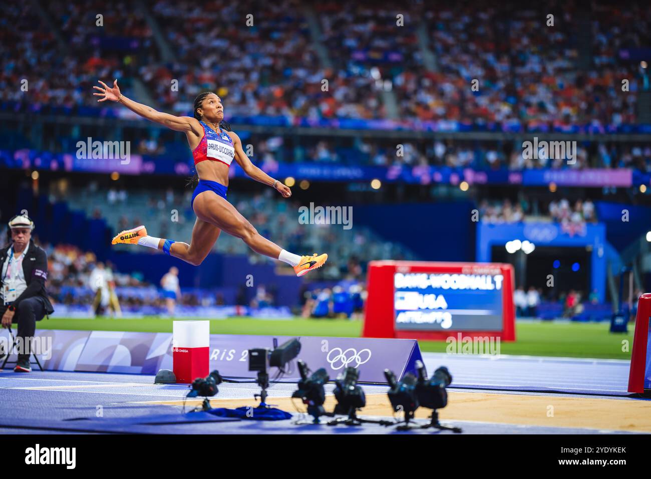 Tara Davis-Woodhall participating in the long jump at the Paris 2024 ...