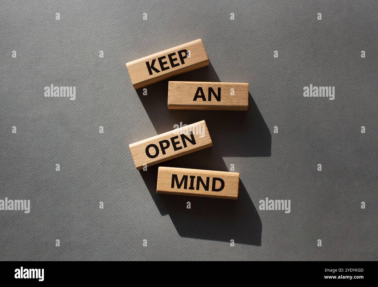 Keep an open mind symbol. Wooden blocks with words Keep an open mind ...