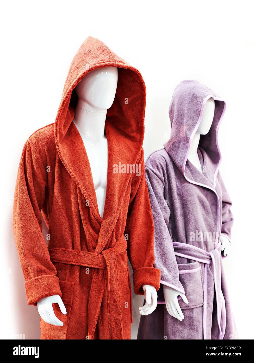 Colored terry robes on a mannequin isolated white background Stock ...