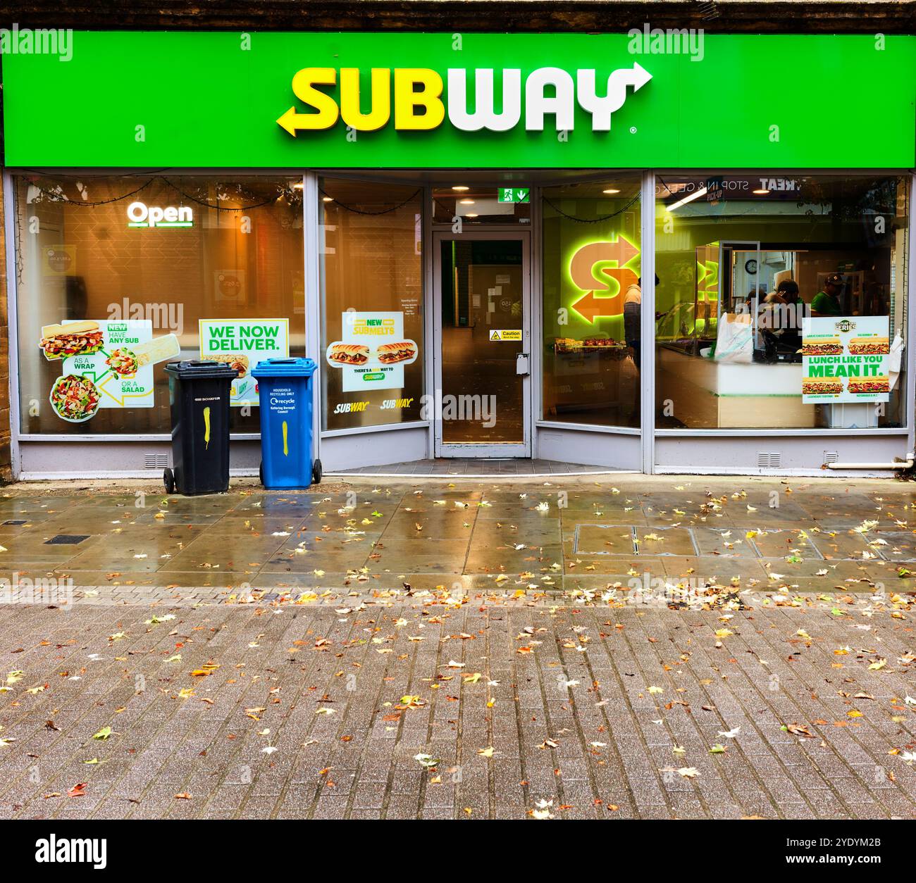 Subway food shop in the town centre at Kettering, England, on a wet day ...