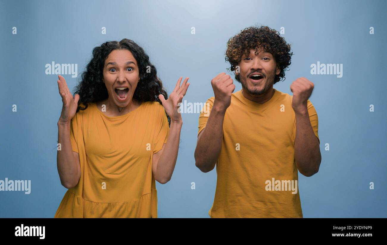 Excited happy shocked wonder amazed surprised Arabian couple winners ...