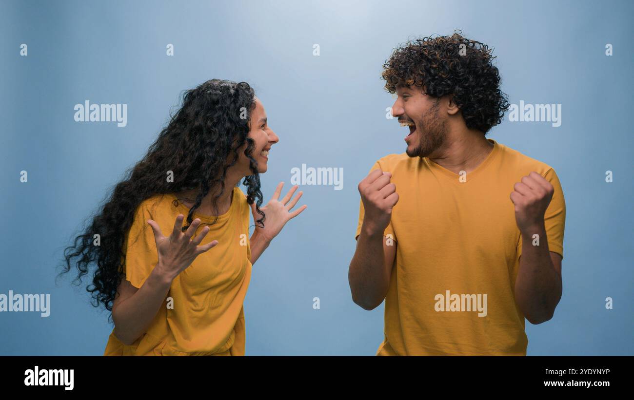 Excited happy shocked wonder amazed surprised Arabian couple winners ...
