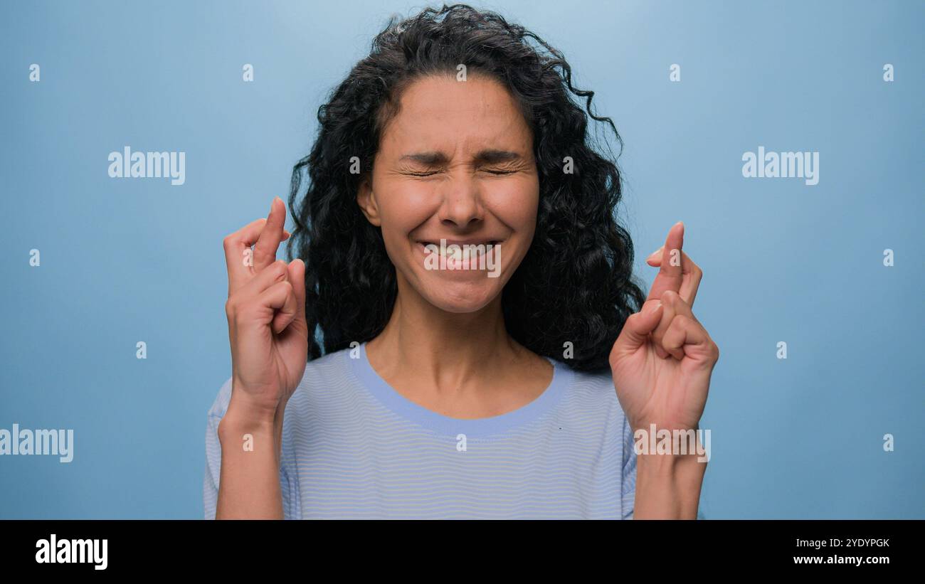 Happy hopeful Indian woman Latino girl Arabian female model fingers ...