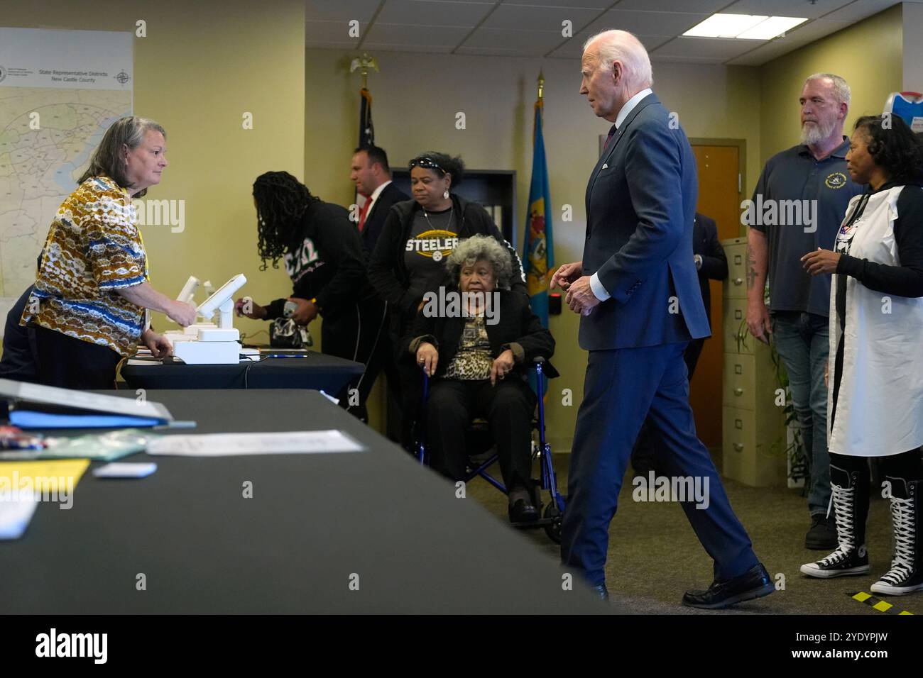 President Joe Biden walks to cast his his early-voting ballot for the ...