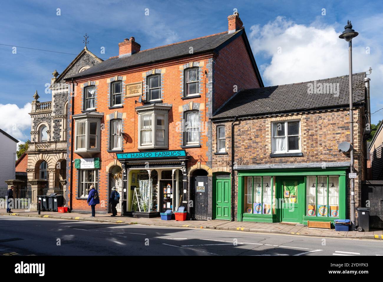 Traditional shops on the High Street of Llanidloes in Mid Wales Stock ...
