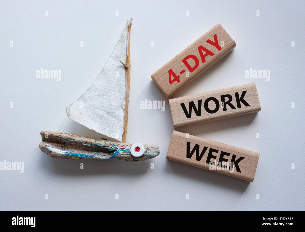 4-day work week symbol. Concept words 4-day work week on wooden blocks ...