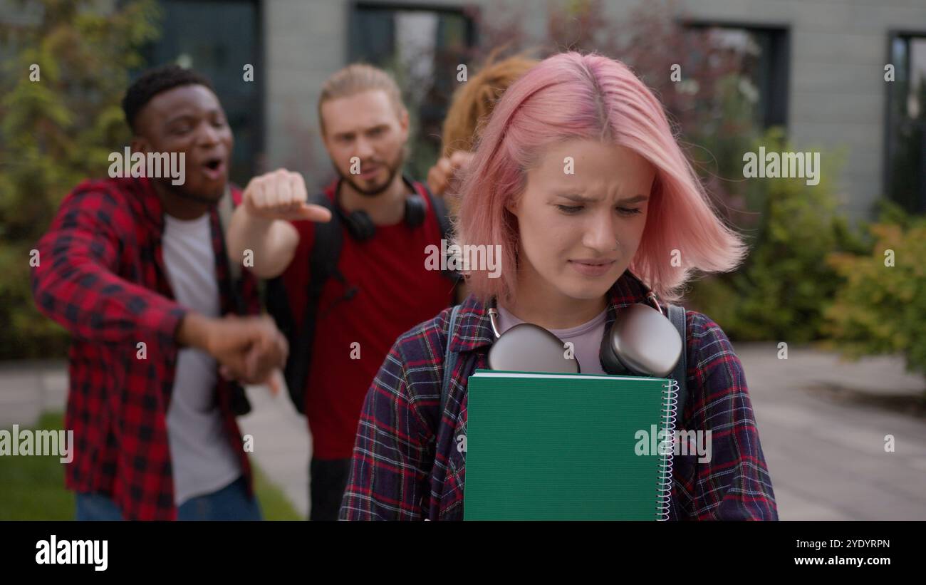 Group multiracial students teens classmates showing thumb down mock ...