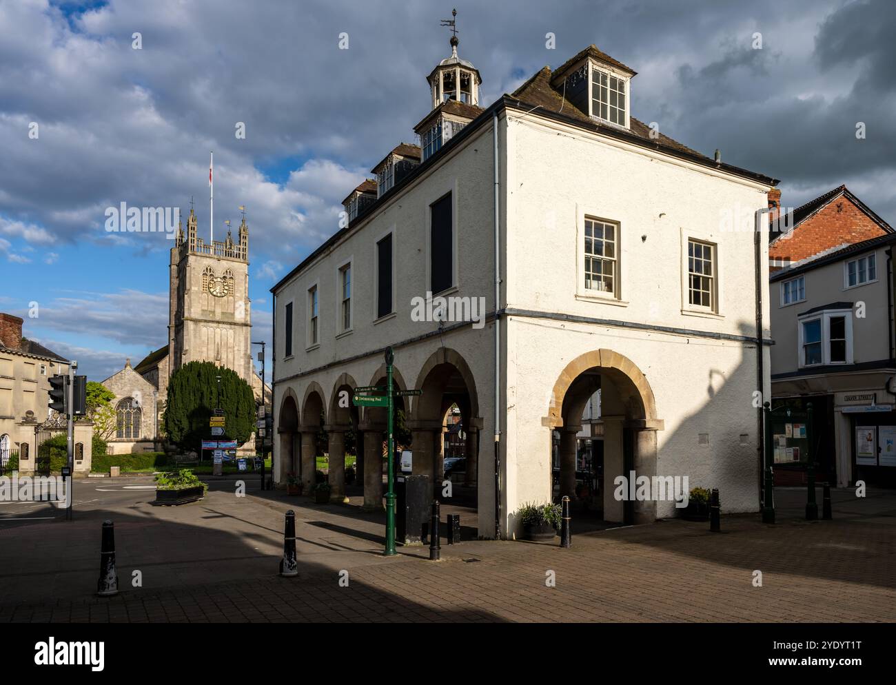 Evening sun shines on the traditional raised Market House and parish ...