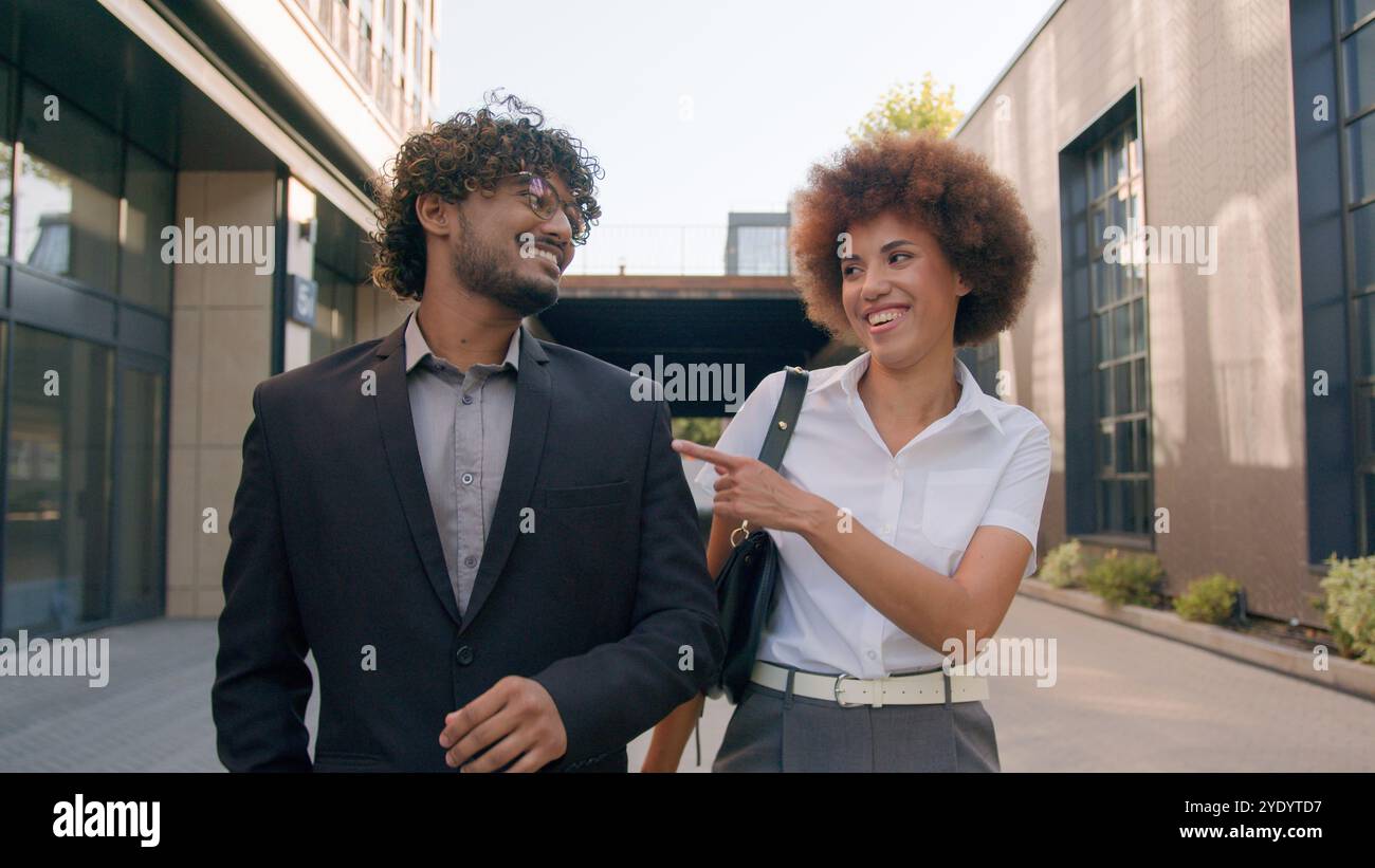 Business diverse multiracial colleagues coworkers in city outdoors ...