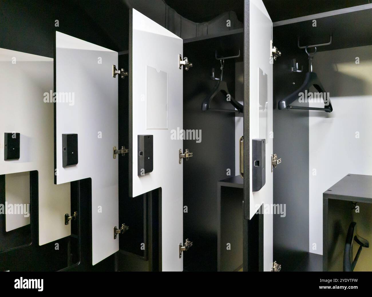 Open lockers for clothes with electronic lock Stock Photo - Alamy