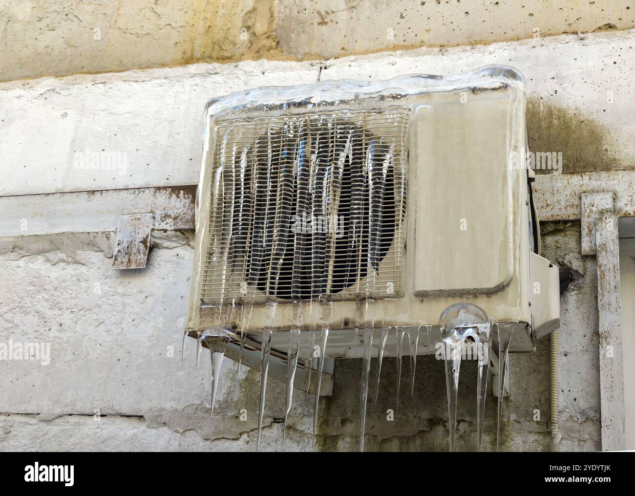 Frozen outdoor air conditioner unit Stock Photo - Alamy