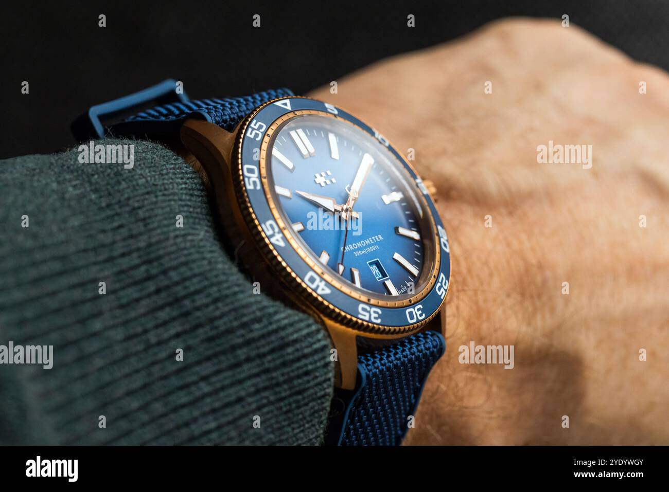 Maidenhead, UK - October 23, 2024: Premium mens watch C60 Pro 300 Bronze, certified Swiss made ...