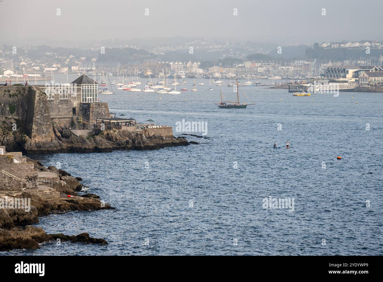 A traditional sailing barge travels along the Cattewater in Plymouth ...