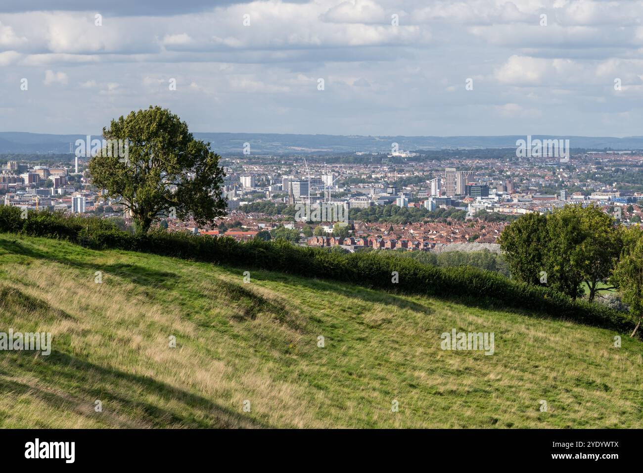 The cityscape of Bristol is laid out below the slopes of Maes Knoll hill in Somerset Stock Photo ...