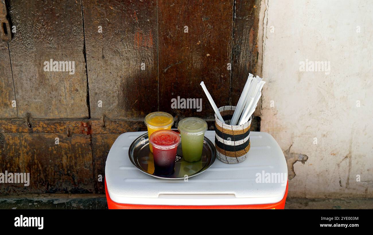 tiny stall selling fresh cold drinks in stonetowns narrow alleys Stock ...