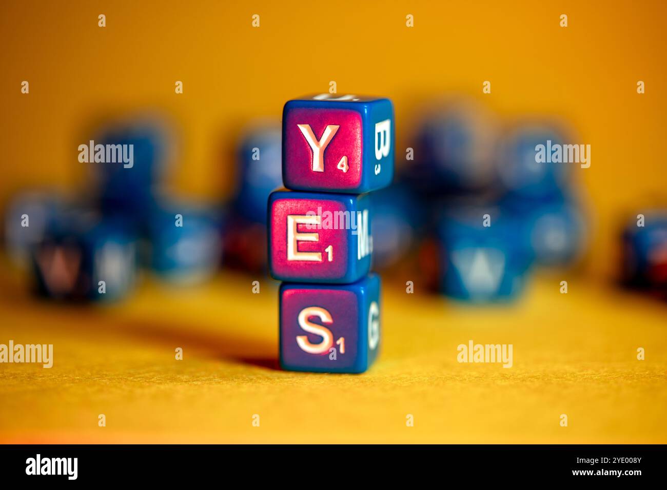 Word "yes" built with cubes from a word-forming game with a yellow ...