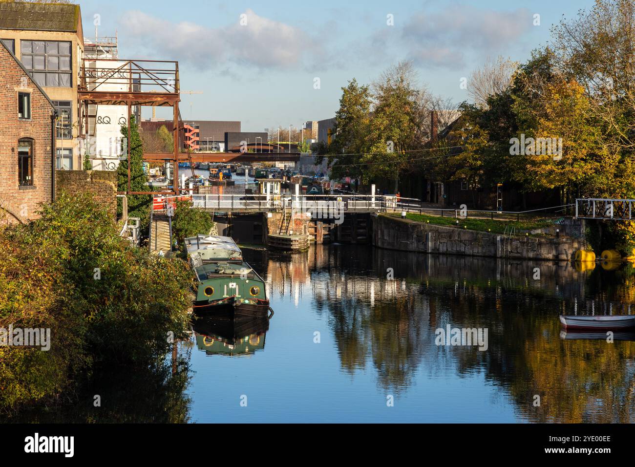 Houseboats are moored in the River Lee Navigation at Old Ford Locks beside London's Olympic Park ...
