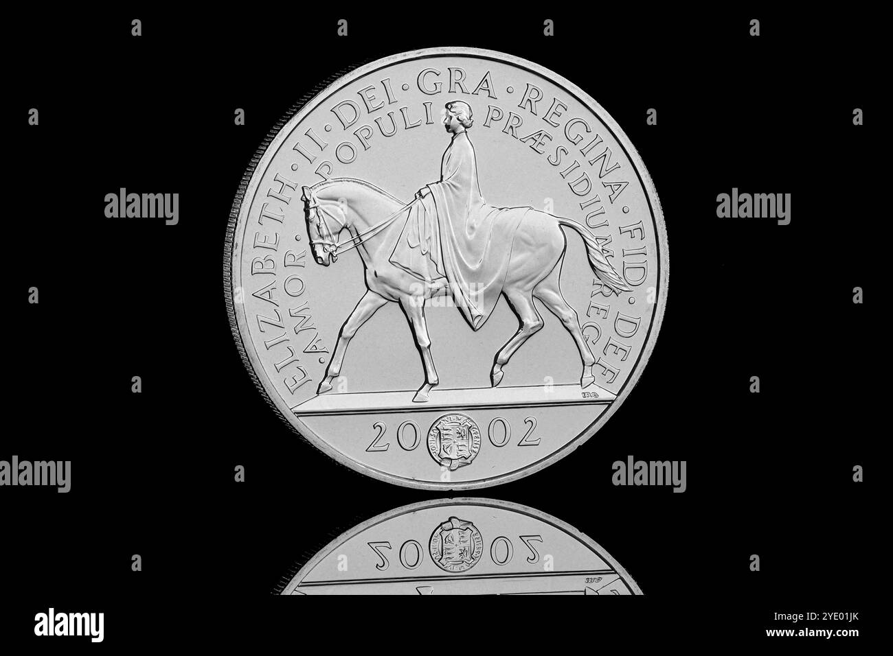 2002 £5 coin showing Queen Elizabeth II on horseback. This was released ...