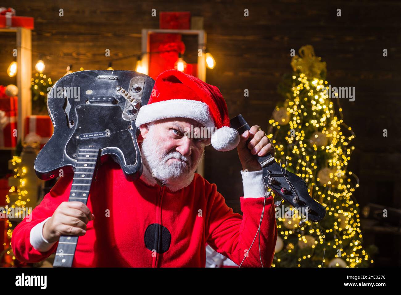 Merry Christmas. Happy New Year. Angry Santa Claus with broken guitar ...